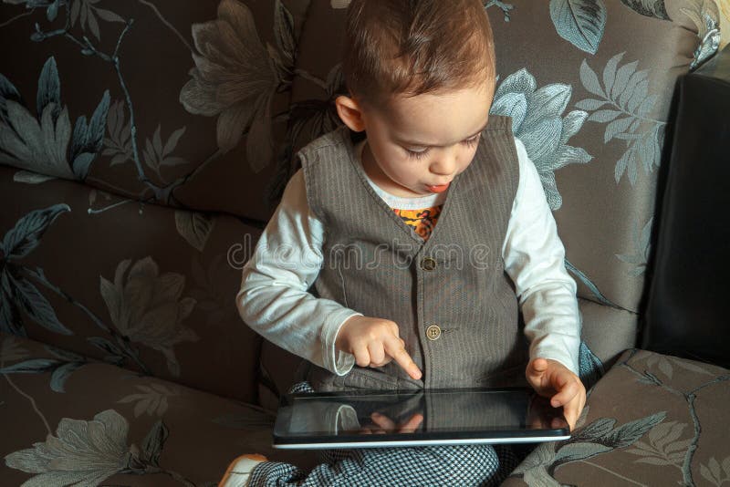 Little boy with tablet stock image. Image of smart, business - 75923751