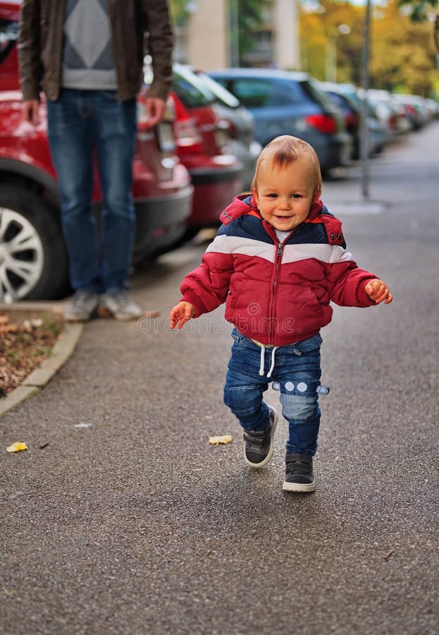 Little Boy Taking His First Steps Stock Image - Image of fall, gentle ...