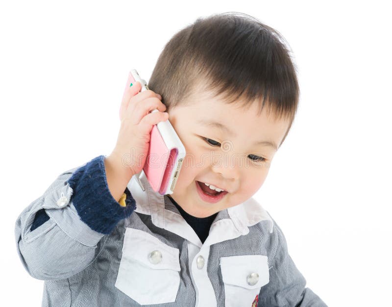 Kid talking on smartphone stock photo. Image of asian - 40001874