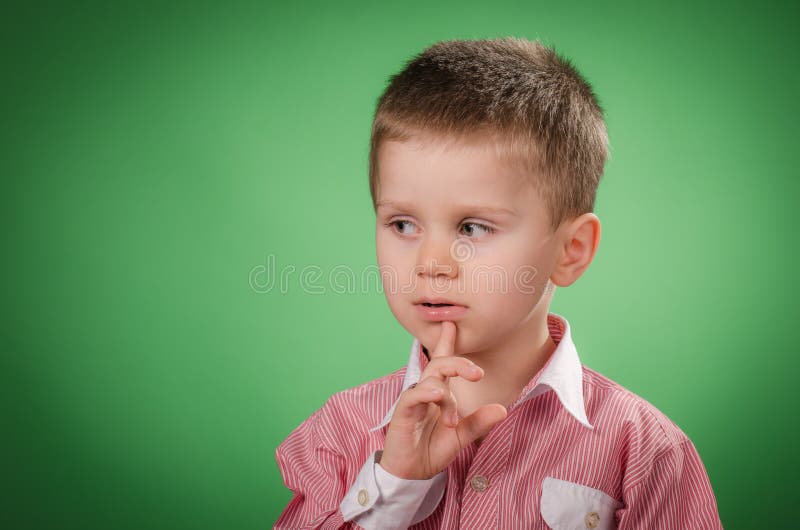 Little boy thinking stock image. Image of green, innocence - 38659357