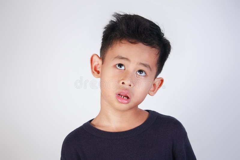 Little Boy Thinking Something Stock Image - Image of think, studio ...
