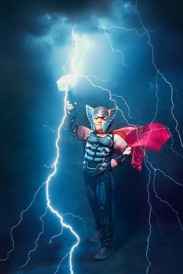 Little boy in thor costume stock photo. Image of lightning - 125663300