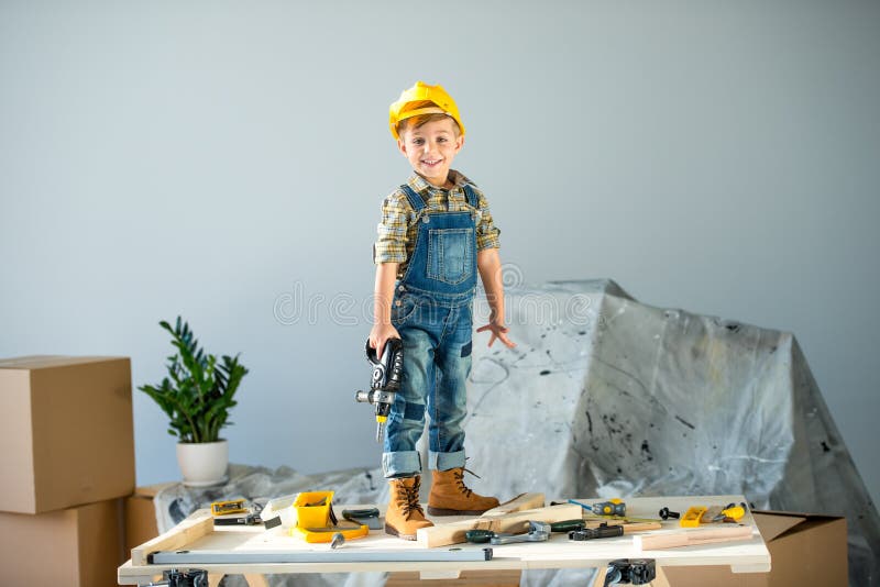 Little boy with tools stock image. Image of laborer, caucasian - 90730993