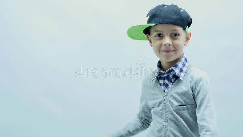 Little Boy with Toothless Smile Shows Two Fingers Stock Video - Video ...