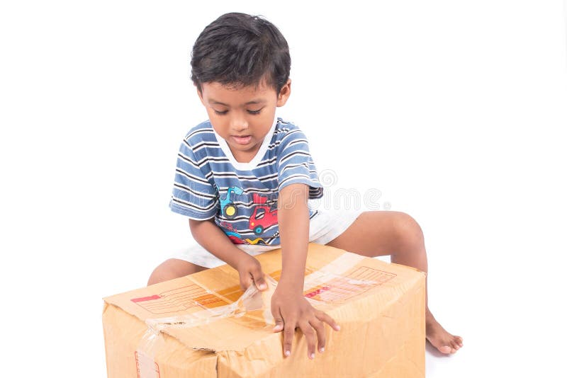 Little boy trying open box stock image. Image of wait - 85191733