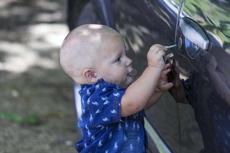 Little Boy Trying To Unlock Car Stock Photos - Free & Royalty-Free ... Little Boy Trying To Unlock Car Stock Photos - Free & Royalty-Free ...