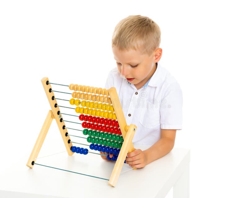 Little Boy Uses Abacus Solve Mathematical Problems Stock Photos - Free ...