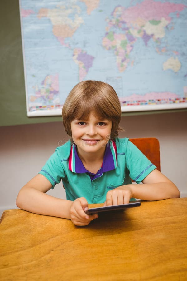 Little Boy Using Digital Tablet in Classroom Stock Image - Image of ...
