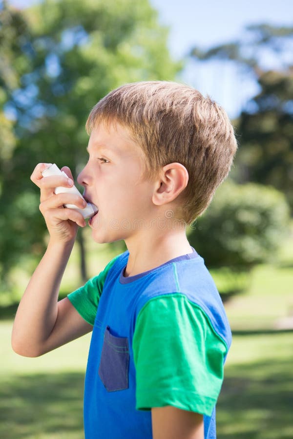 Little Boy Using His Inhaler Stock Image - Image of asthmatic ...