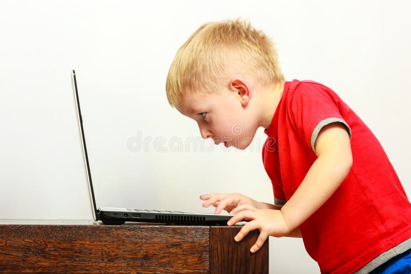 Little Boy Using Laptop Pc Computer at Home Stock Photo - Image of ...