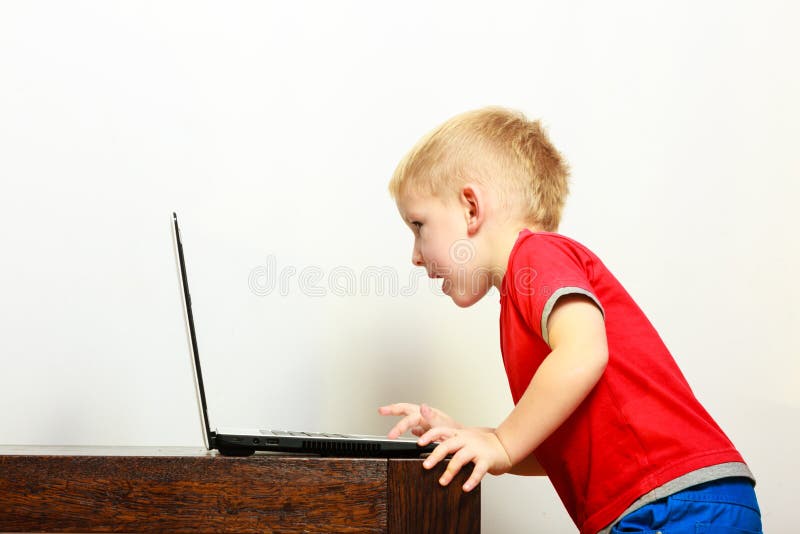 Little Boy Using Laptop Pc Computer at Home Stock Image - Image of ...