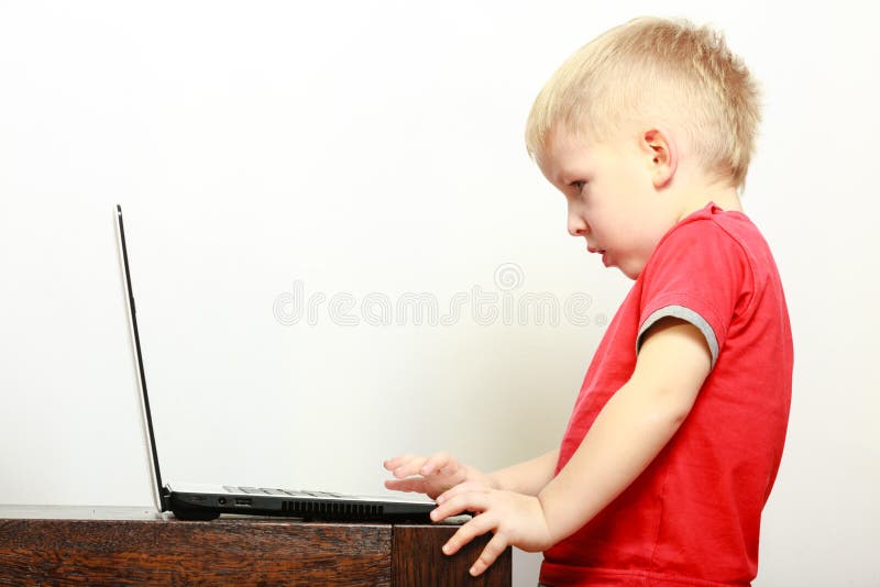 Little Boy Using Laptop Pc Computer at Home Stock Photo - Image of ...