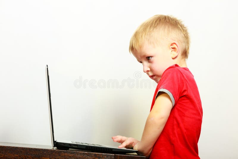 Little Boy Using Laptop Pc Computer at Home Stock Image - Image of ...
