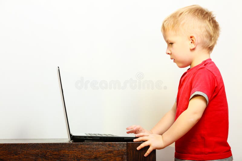 Little Boy Using Laptop Pc Computer at Home Stock Image - Image of ...