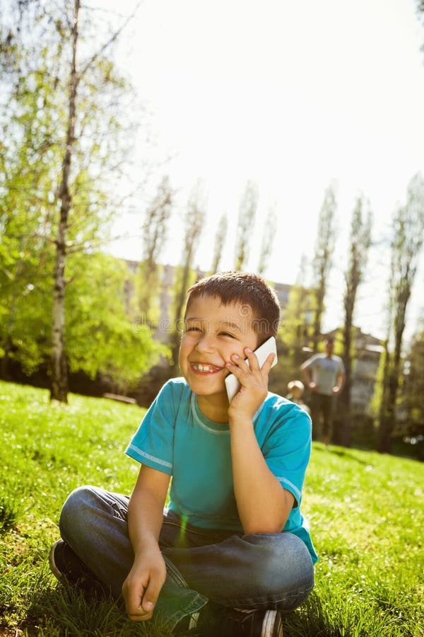 Little Boy Using Smart Phone Stock Image - Image of casual ...