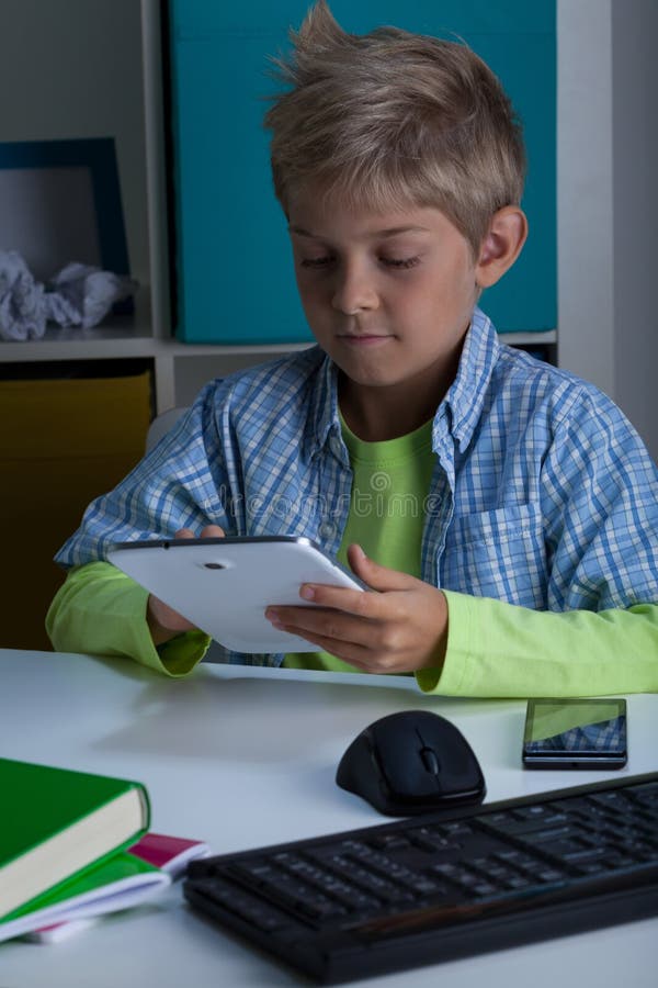 Little boy using tablet stock image. Image of school - 48366053