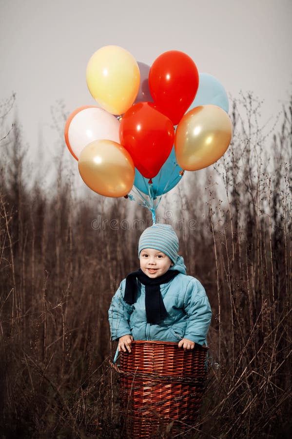 Little Boy Wants To Fly on Balloons Stock Photo - Image of colorful ...