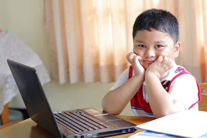 Little Boy Was Playing Notebook. Stock Image - Image of people ...