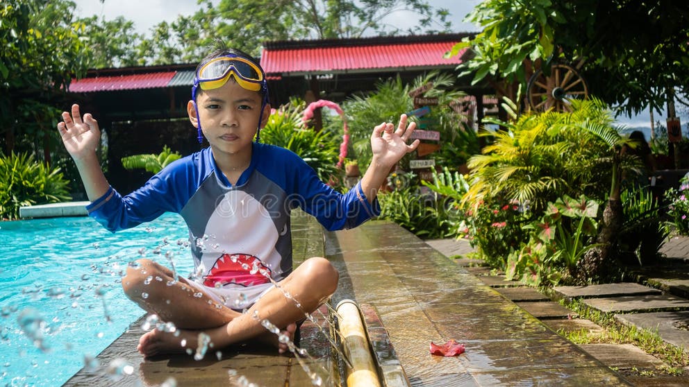 A Little Boy Was Sitting by the Pool Stock Photo - Image of infant ...