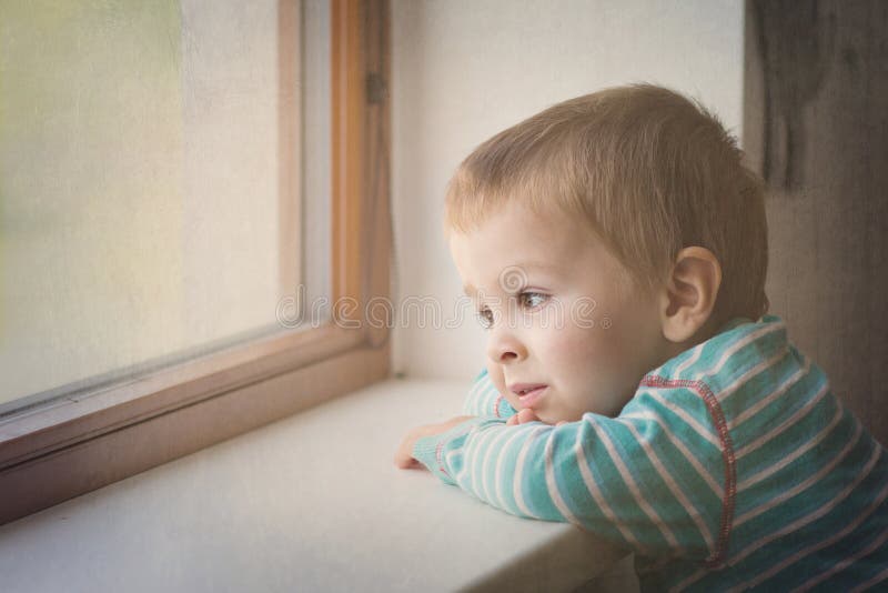 Little boy on the window stock image. Image of little - 37525919