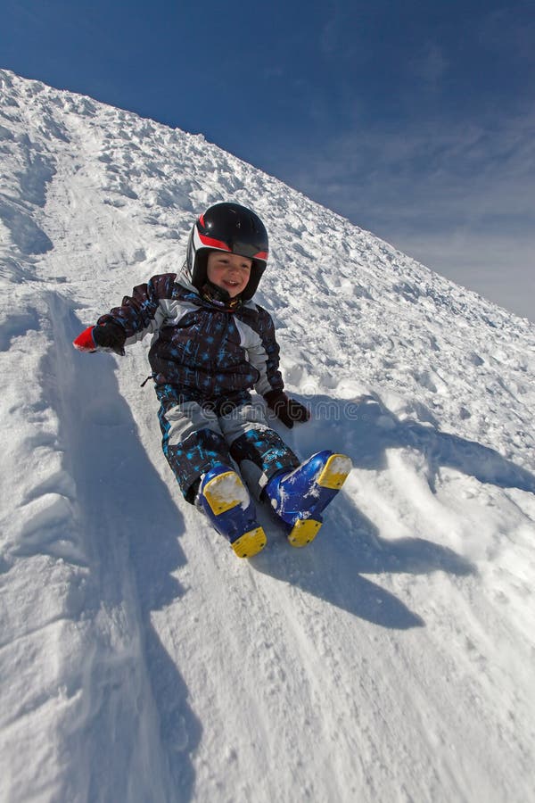 Little boy and winter fun. stock photo. Image of adventure - 69374894