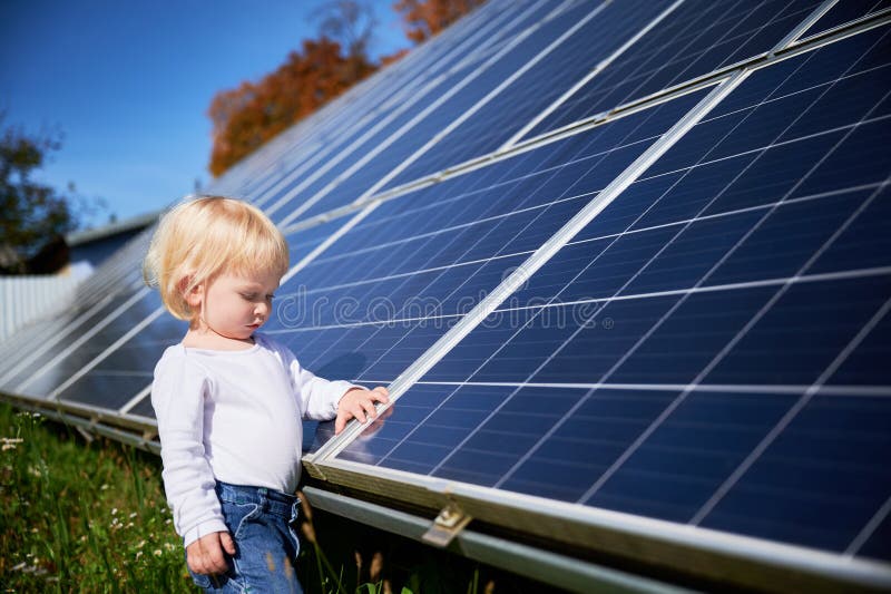 Little Boy Wondering What Solar Panel is Stock Photo - Image of child ...