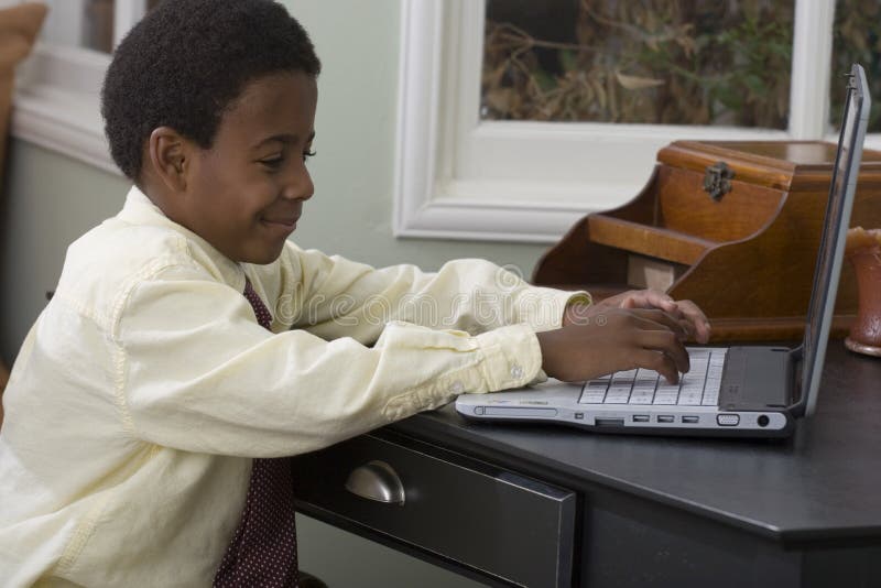 Little Boy Working on the Computer at Home. Stock Image - Image of desk ...