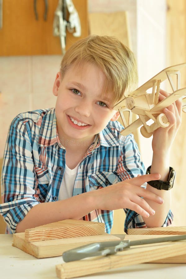 Little Boy Working with Wood Stock Image - Image of home, learning ...