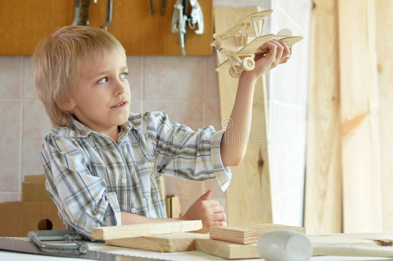 Little Boy Working with Wood Stock Image - Image of carpenter, manual ...