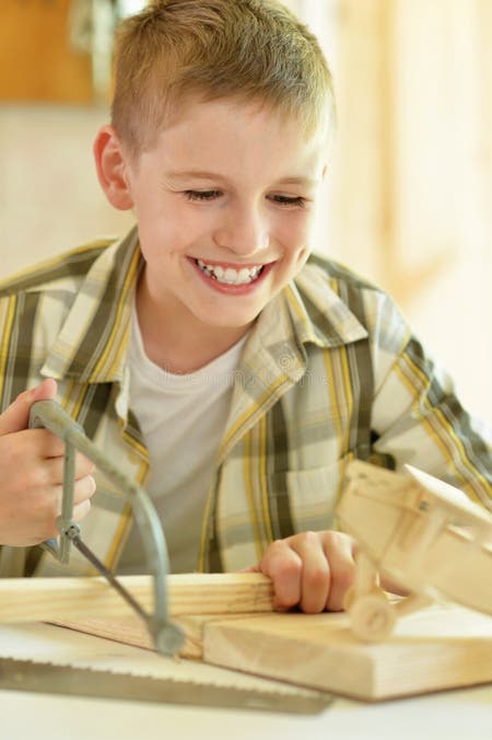 Little Boy Working with Wood Stock Image - Image of home, technology ...