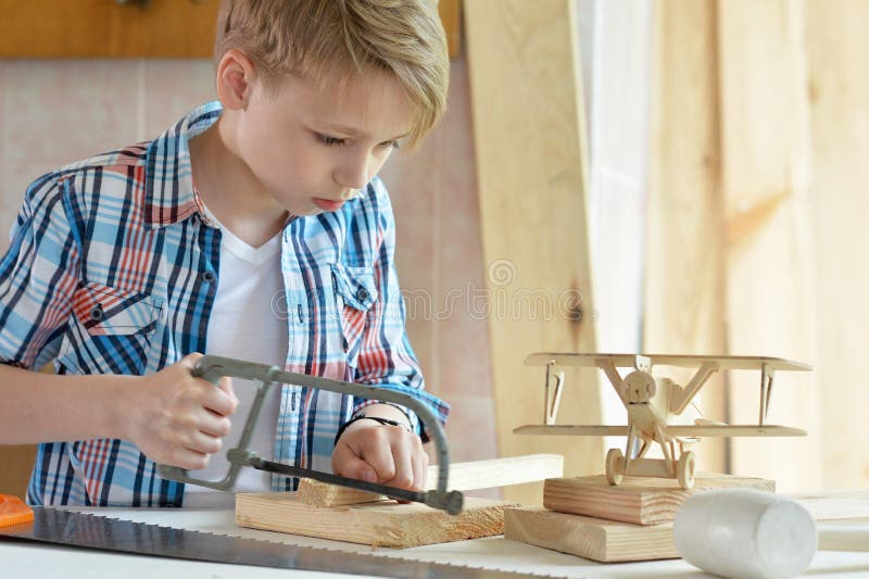 Little Boy Working with Wood Stock Image - Image of home, learning ...