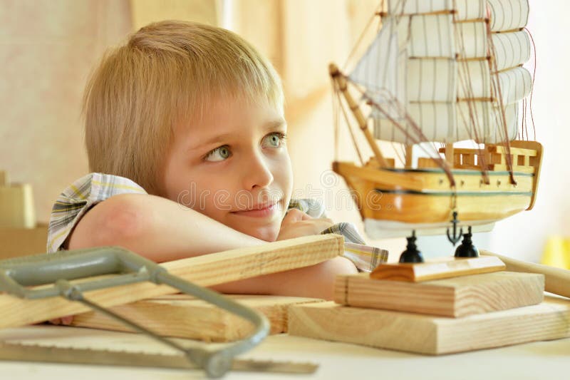 Little Boy Working with Wood Stock Photo - Image of equipment, person ...