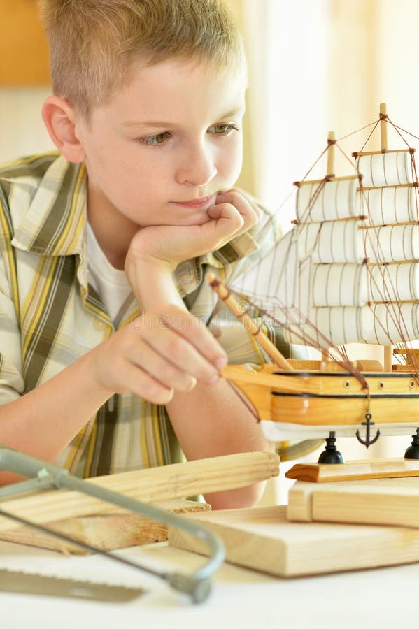 Little Boy Working with Wood Stock Image - Image of carpenter, power ...