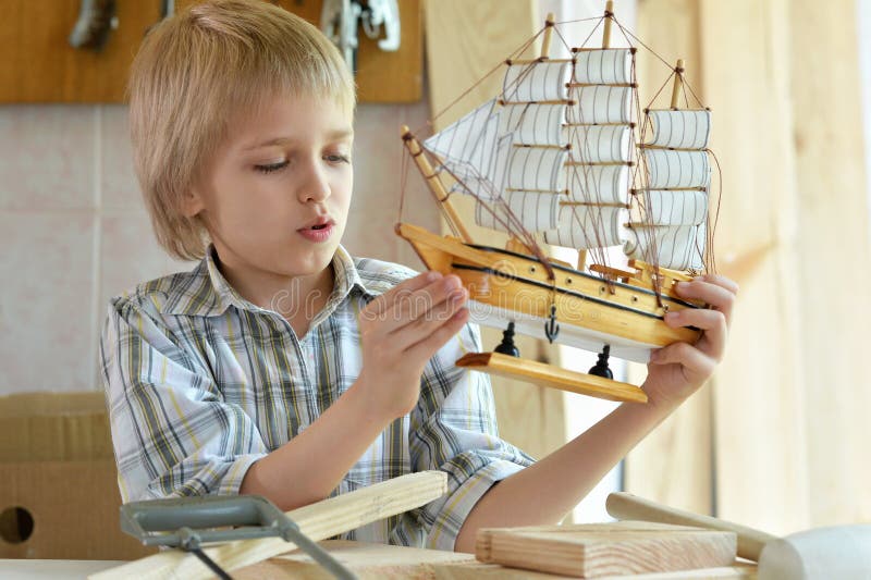 Little Boy Working with Wood Stock Photo - Image of caucasian, little ...