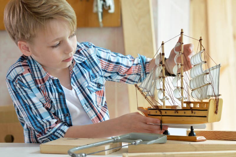 Little Boy Working with Wood Stock Photo - Image of instrument, little ...