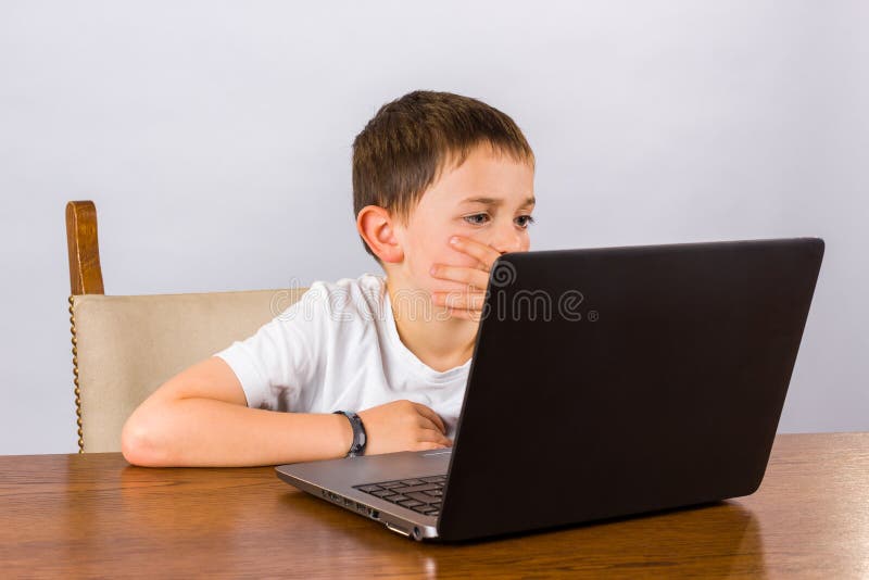 Boy working on laptop stock photo. Image of internet - 102744818