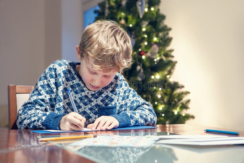 Little Boy Write a Cogratulations Christmas Card Stock Image - Image of ...
