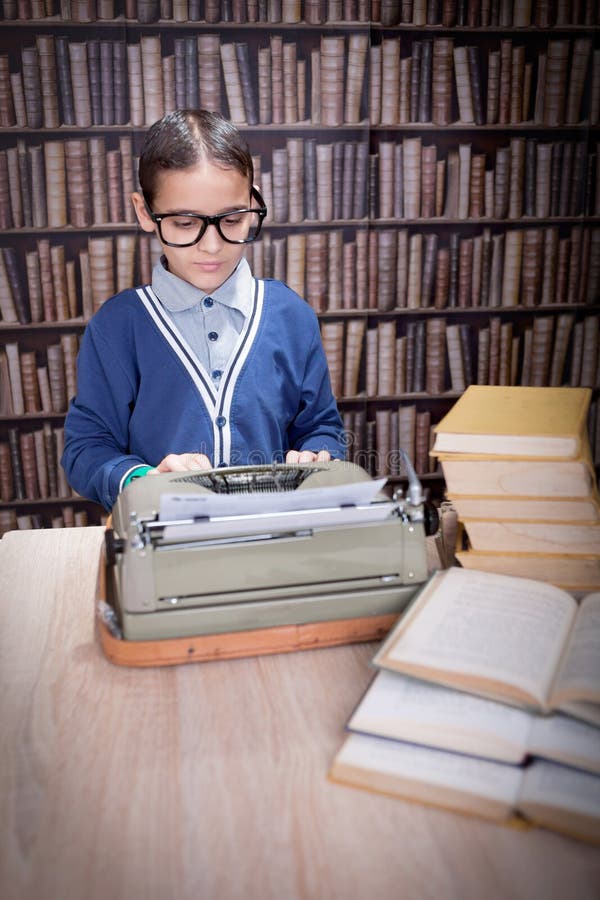 Little Boy Writer on Desk with Typewriter in Library Stock Photo ...