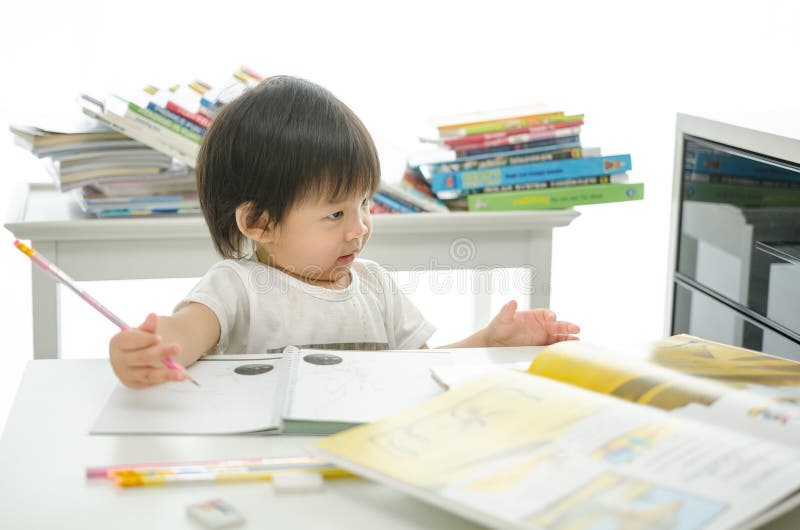 Little boy is writing stock image. Image of preschooler - 41795755