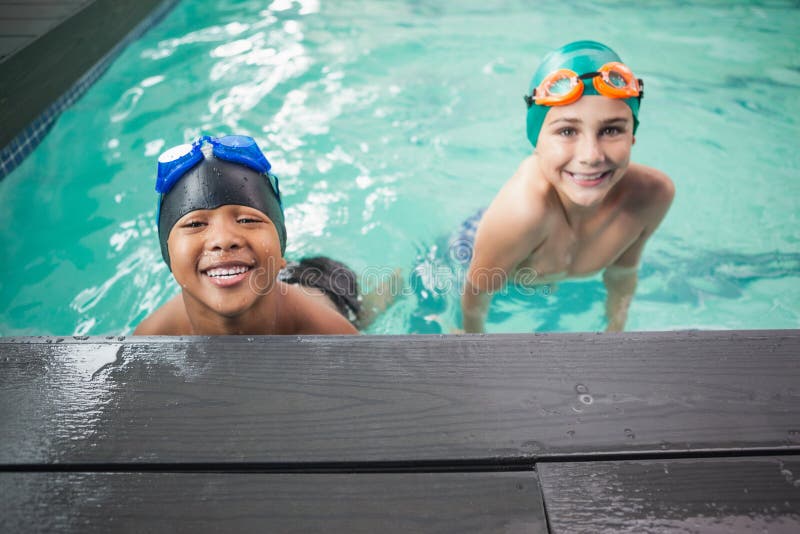 Cute Little Boy Sitting Poolside Stock Photo - Image of goggles ...