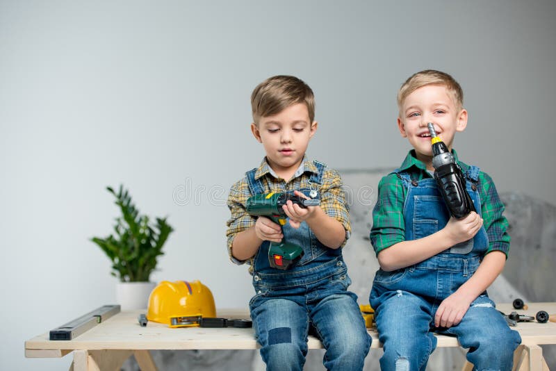 Little boys with tools stock image. Image of adorable - 90730525
