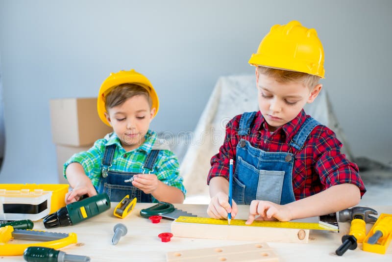 Little boys with tools stock image. Image of playing - 90730527