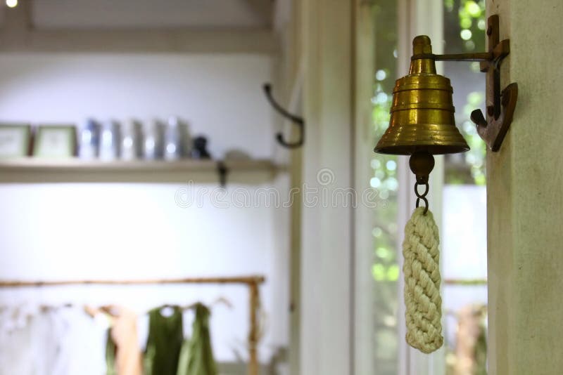 Little Brass Bell in Vintage Shop Stock Photo - Image of golden, gift ...