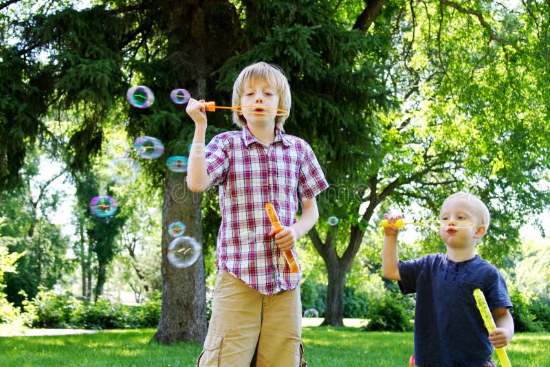 Little Brother Copying Big Brother Stock Image - Image of play ...