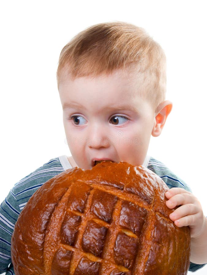 A Little Caucasian Boy Eating a Bread Stock Photo - Image of white ...