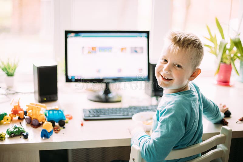 Little Caucasian Boy Playing in Computer Games Stock Photo - Image of ...