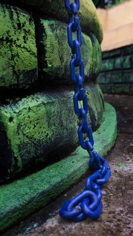 The little chain is blue stock image. Image of wall - 208816143