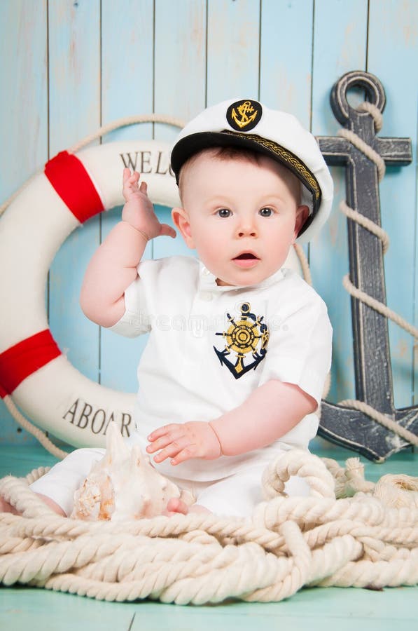 A Little Cheerful Boy Captain in the Maritime Interior Stock Image ...