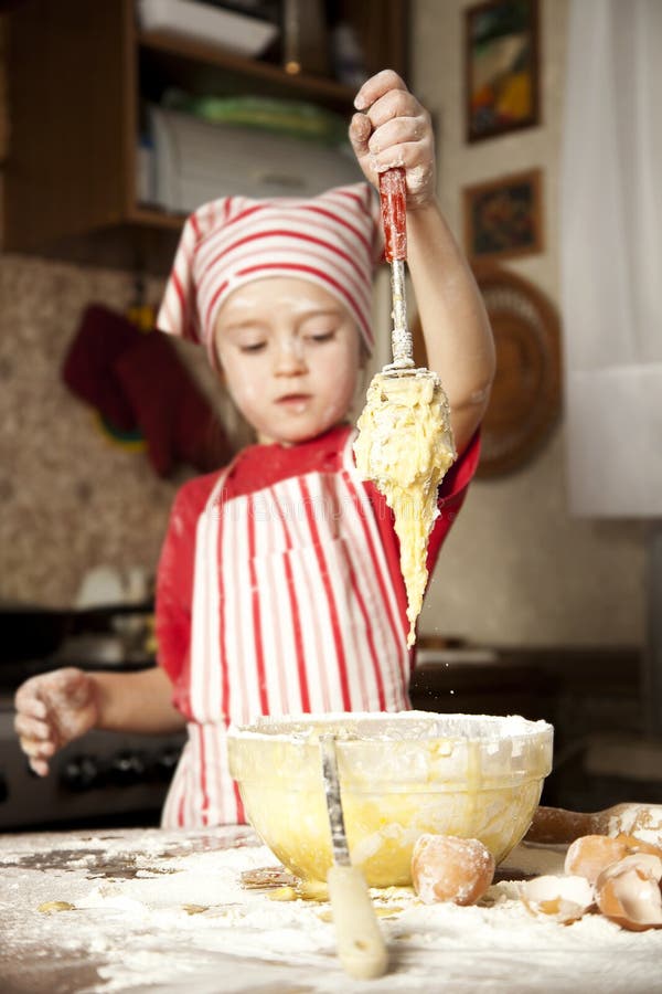 Little chef in the kitchen stock image. Image of happiness - 24020723