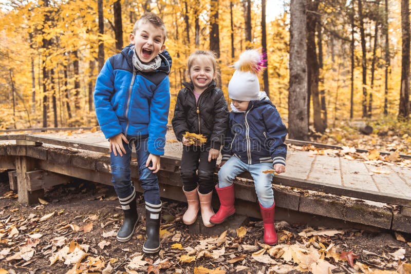 Little Child in the Autumn Season Having Fun Stock Photo - Image of ...
